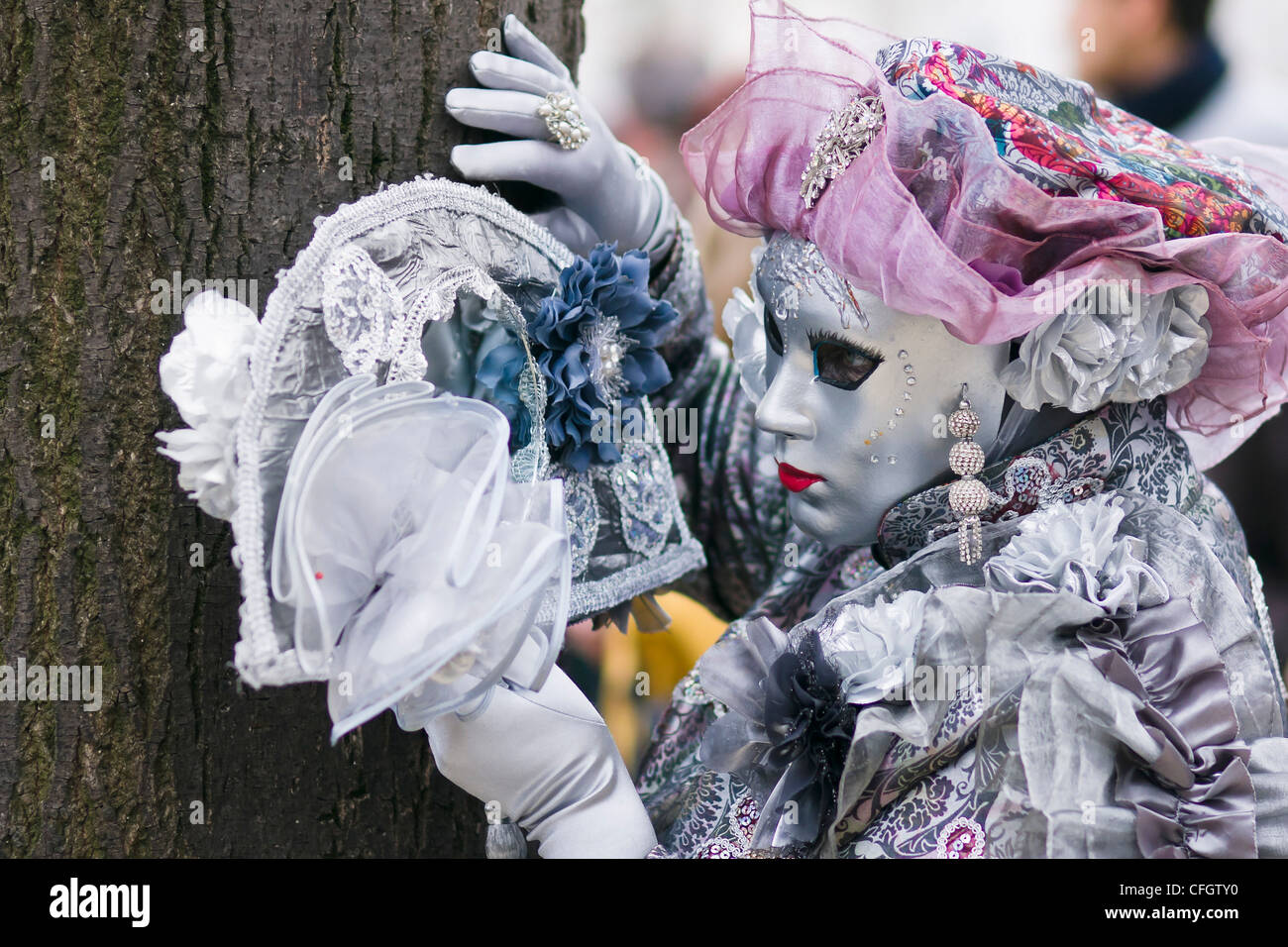 Venetian carnival mask costume parade Stock Photo - Alamy