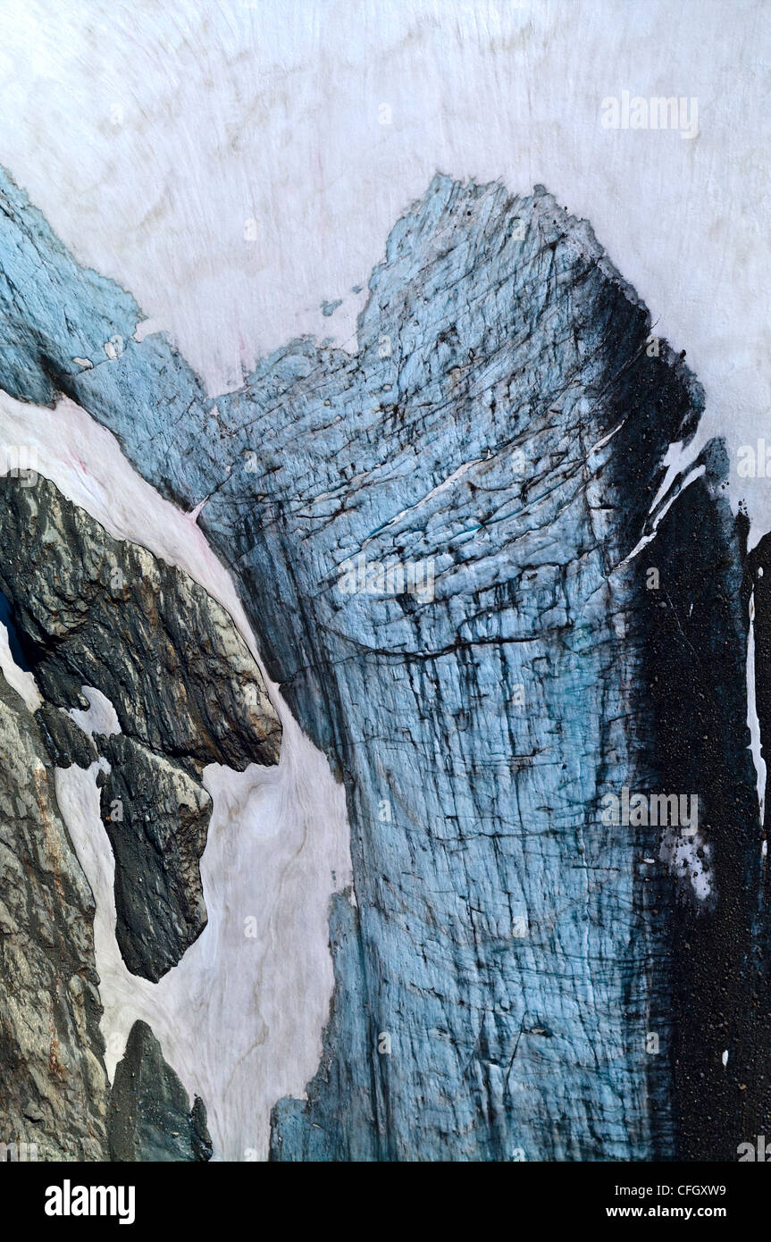 A mosaic of fracture lines on the surface of a weathered glacier Stock ...