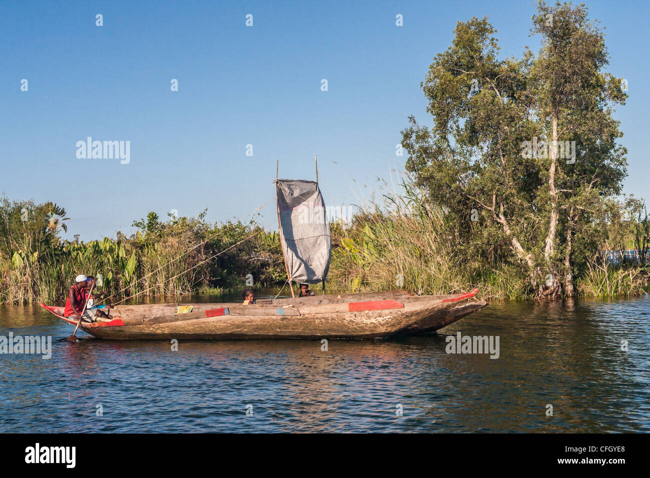 Sailing canoe in the Pangalanes channel, eastern Madagascar Stock Photo ...