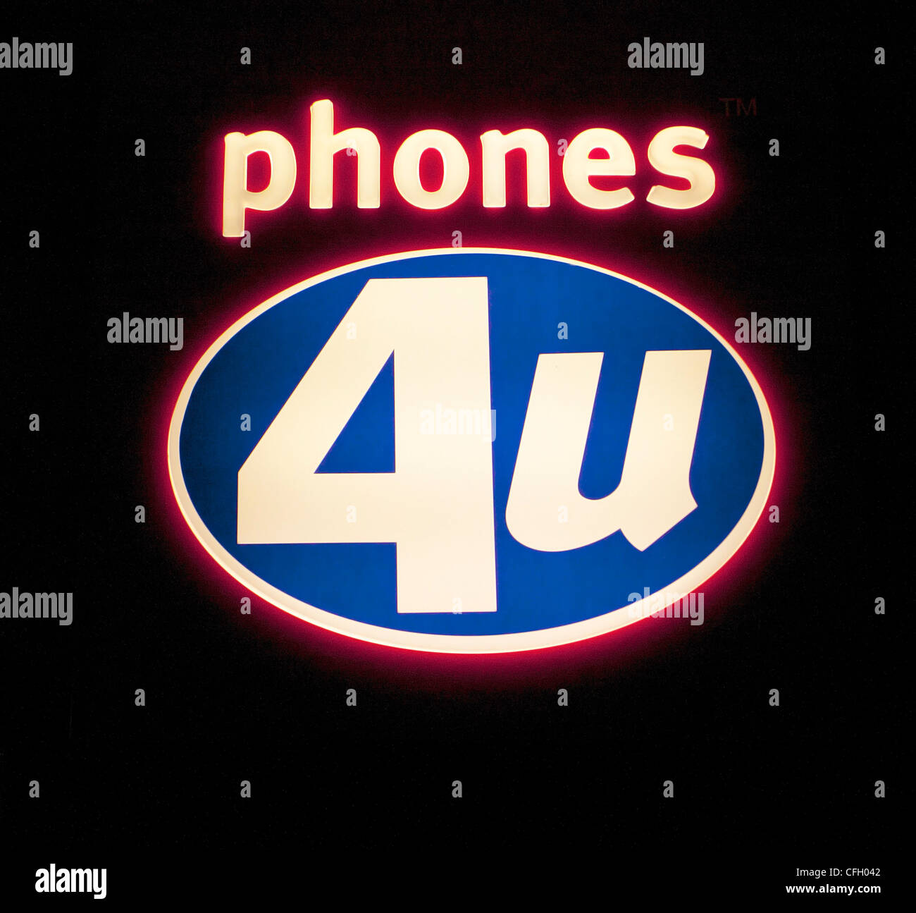 phones4u illuminated shop store sign Stock Photo - Alamy