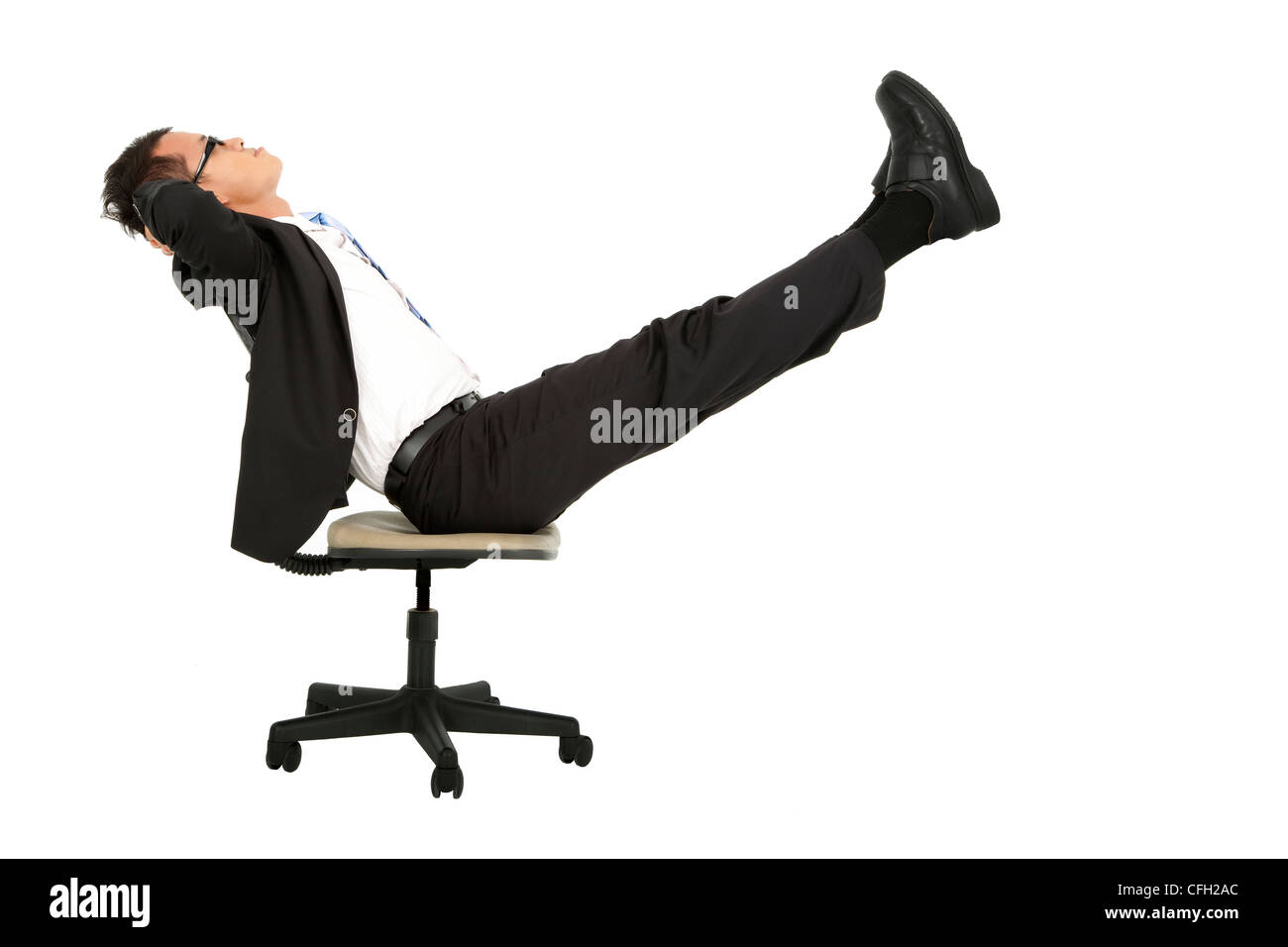 businessman taking a break on the chair Stock Photo - Alamy