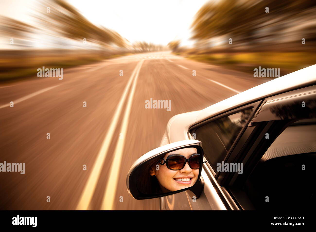 young woman driving car on the road Stock Photo - Alamy