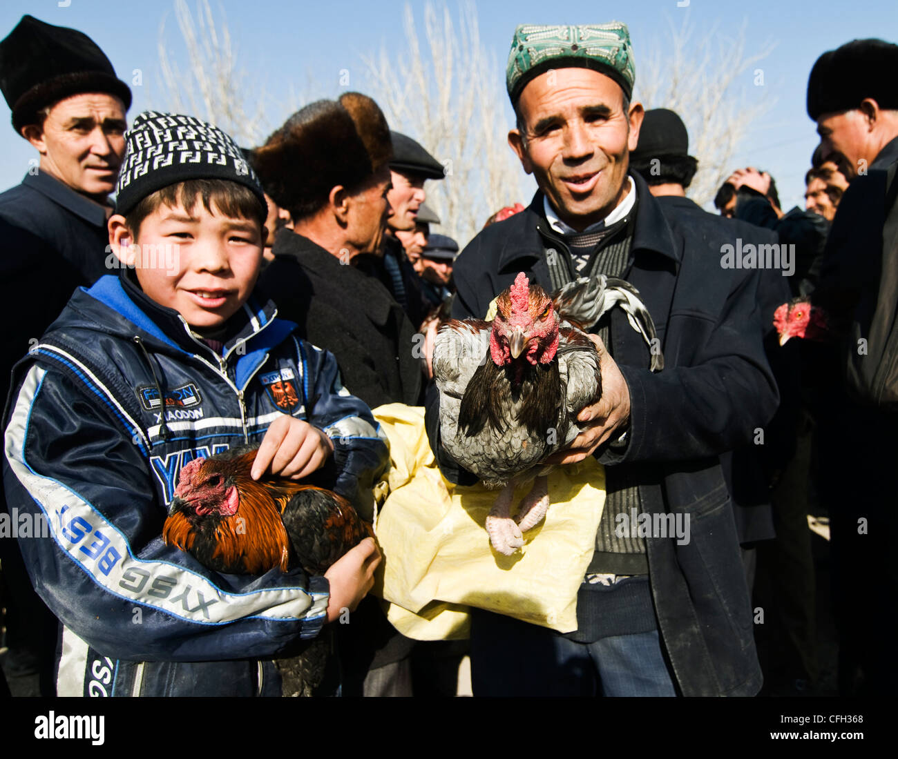 Man holding rooster hi-res stock photography and images - Alamy