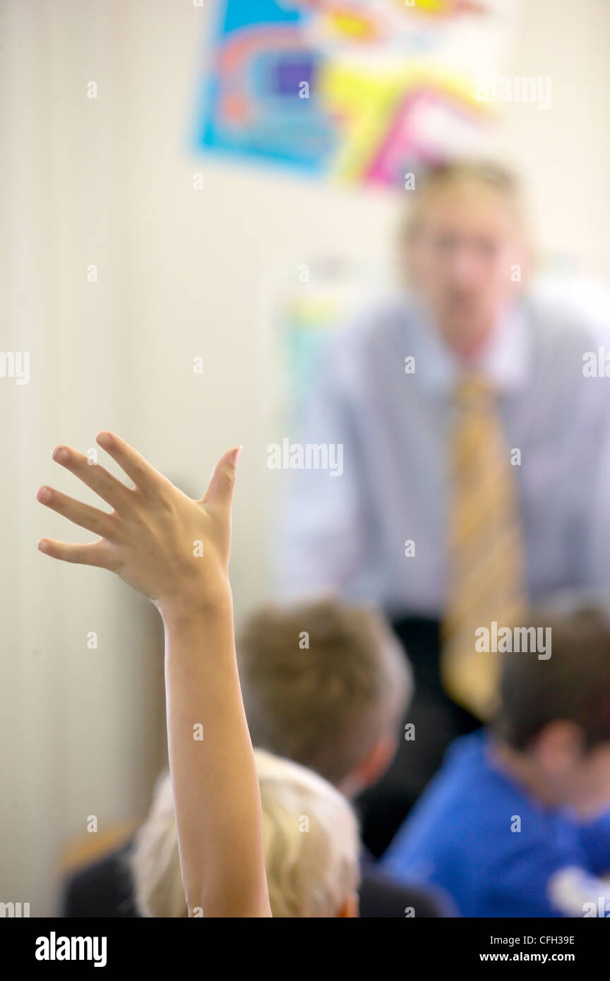 Student Hand up in Class Stock Photo - Alamy