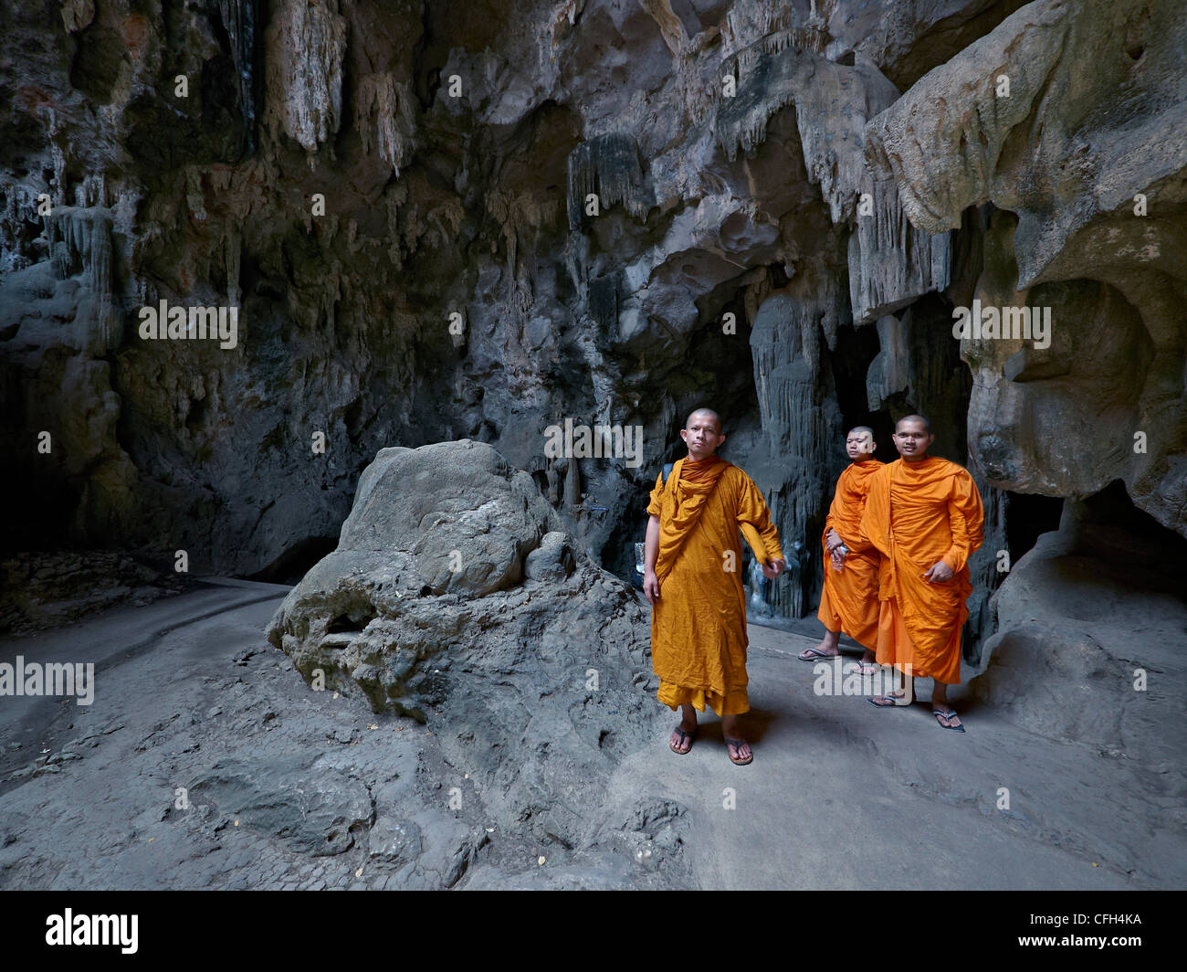 Thailand monks in the underground cave interior at Khao Luang ...