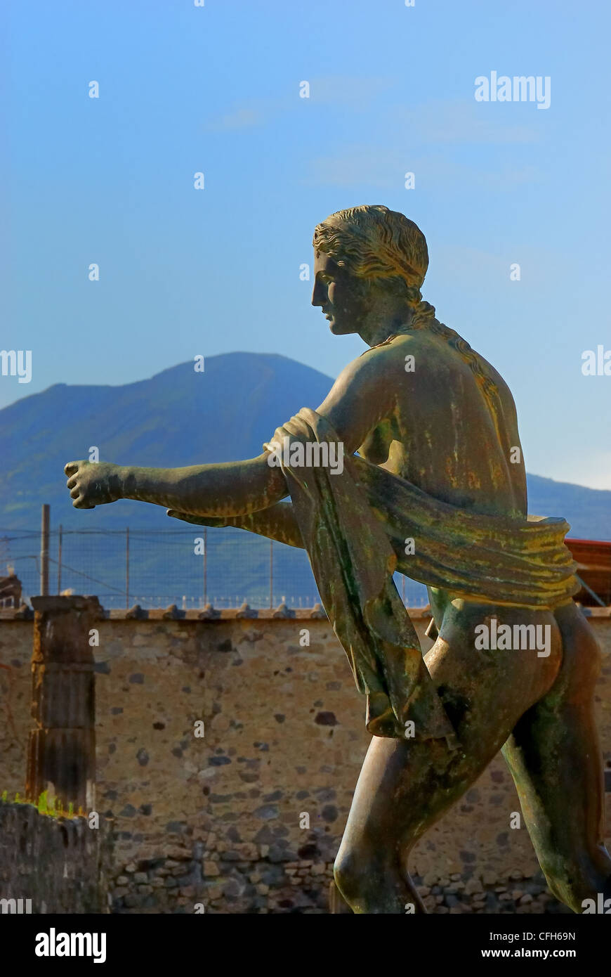 Pompeii, a statue of Apollo. The Vesuvius on the bacikground Stock ...