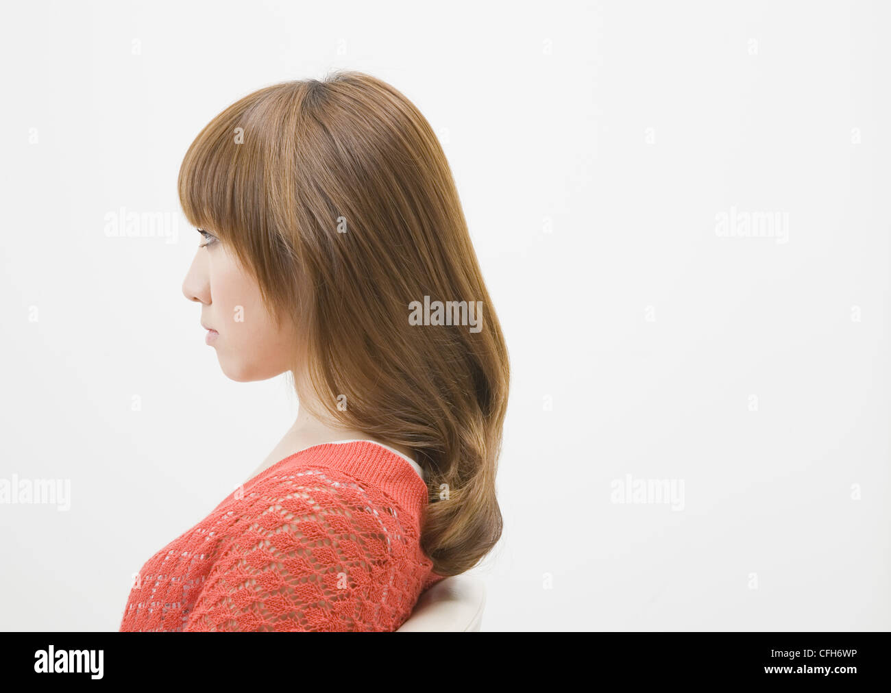 Upper body profile young woman hi-res stock photography and images - Alamy