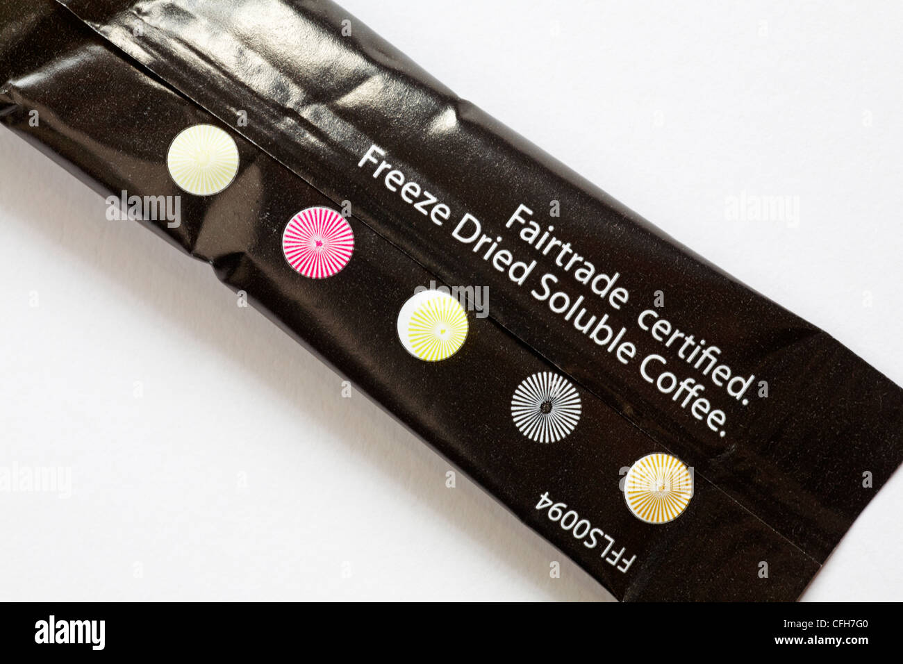 Fairtrade certified freeze dried soluble coffee sachet set on white ...