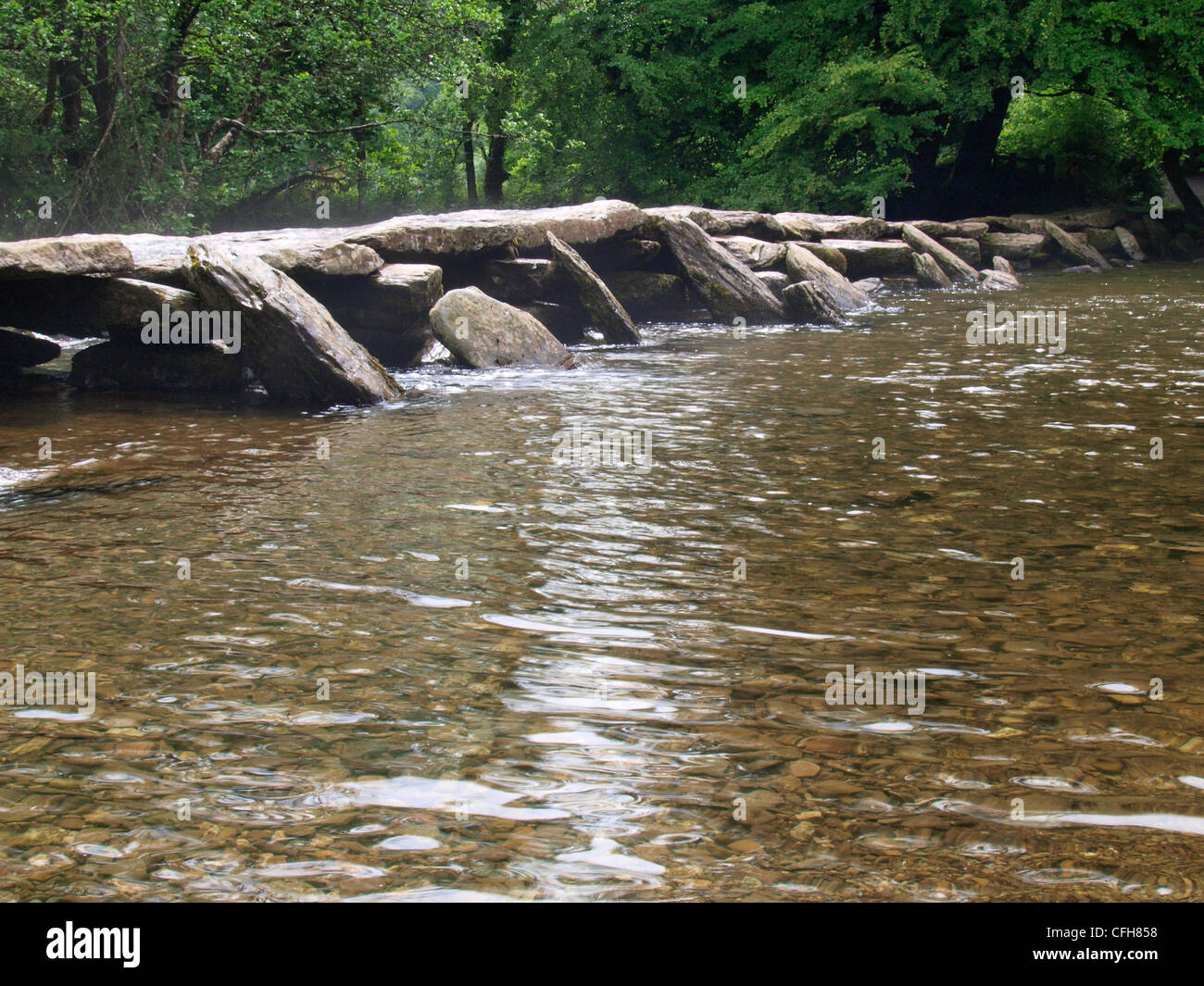 Misty Morning, Tarr steps, an ancient clapper bridge on the River Barle ...