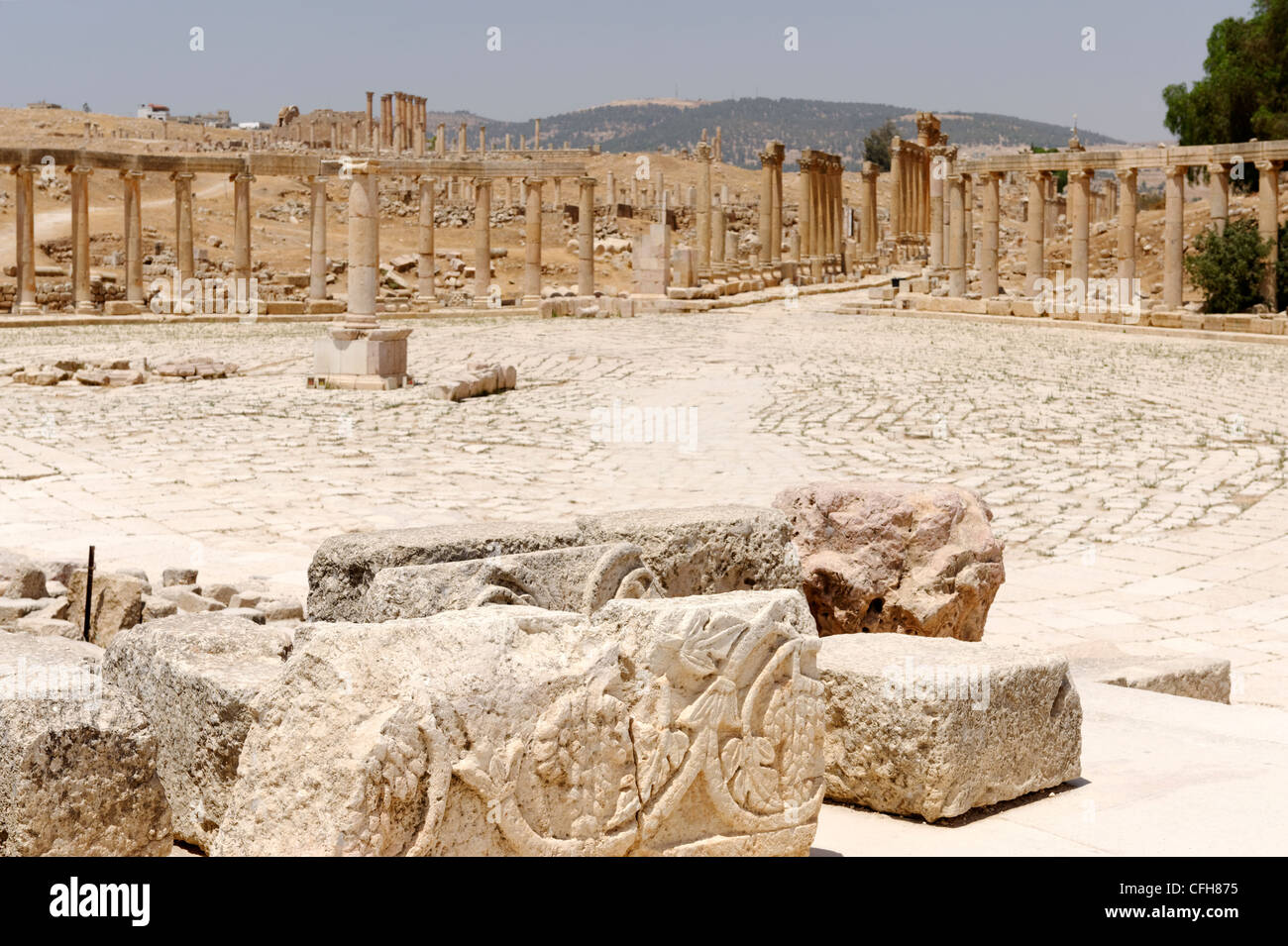 Jerash. Jordan. Architectural fragments lay on the paving of the ...