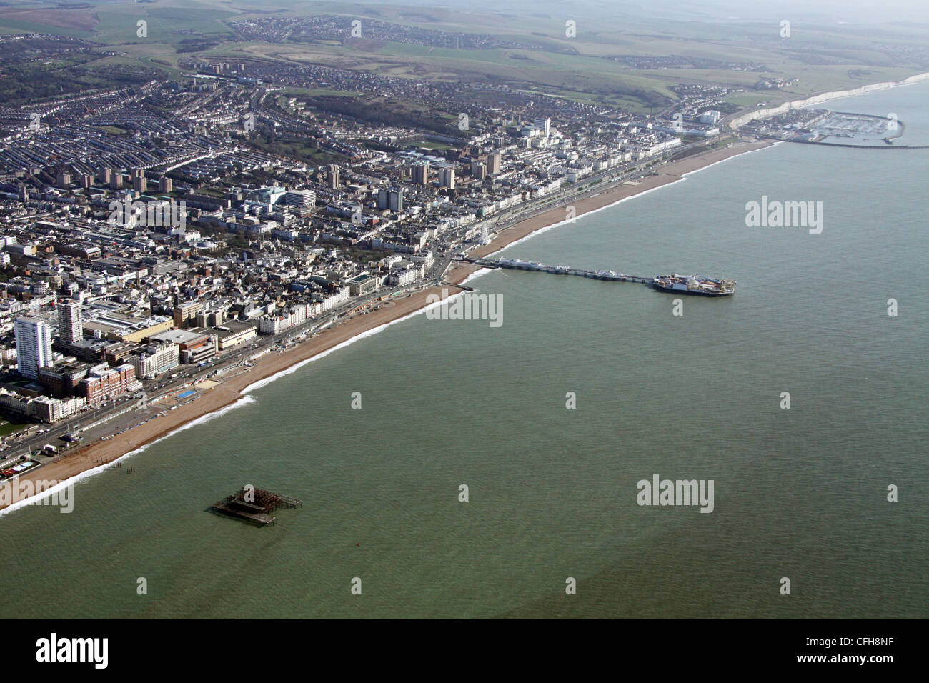 aerial view of Brighton seafront, beach, old Pier, new Pier & Marina ...