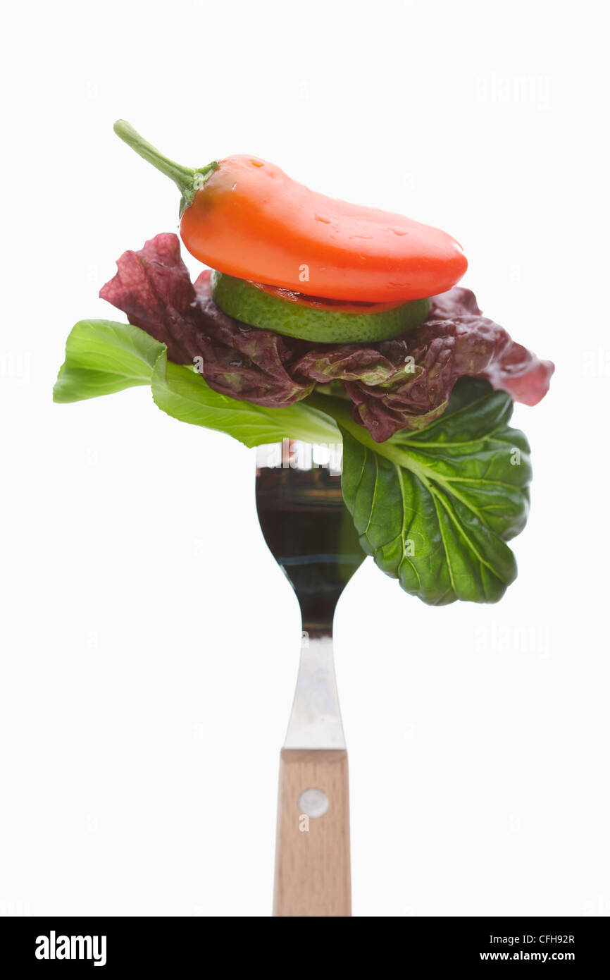 The vegetable speared with the fork Stock Photo - Alamy