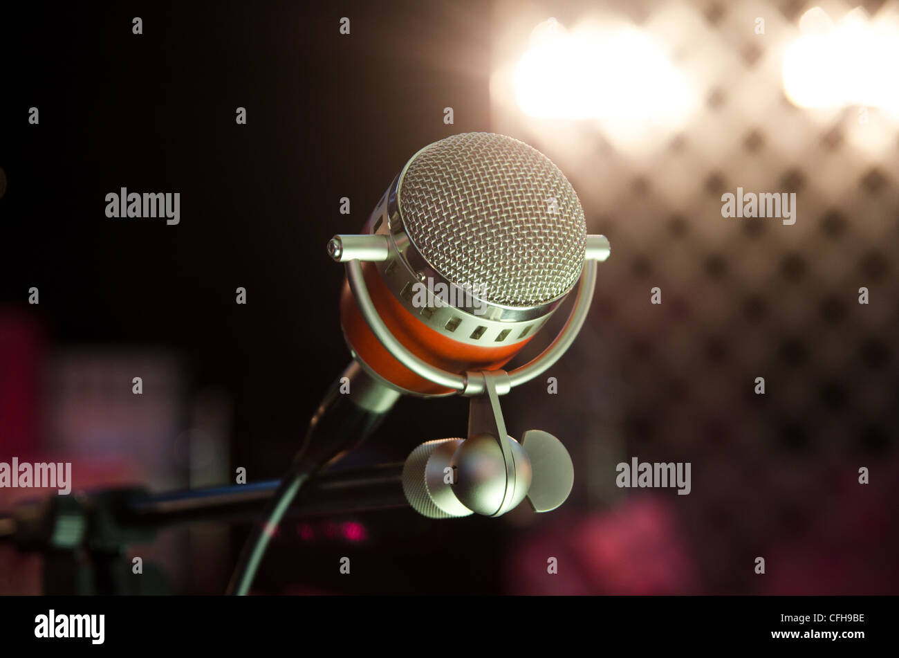 Closeup of audio microphone on stage background Stock Photo - Alamy