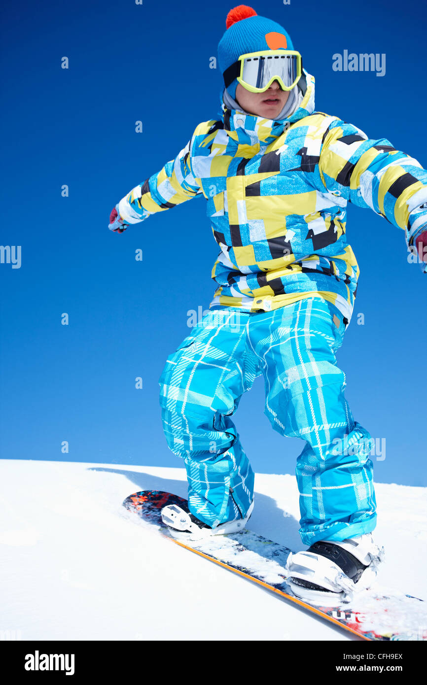 The man snowboarding on the slope Stock Photo - Alamy
