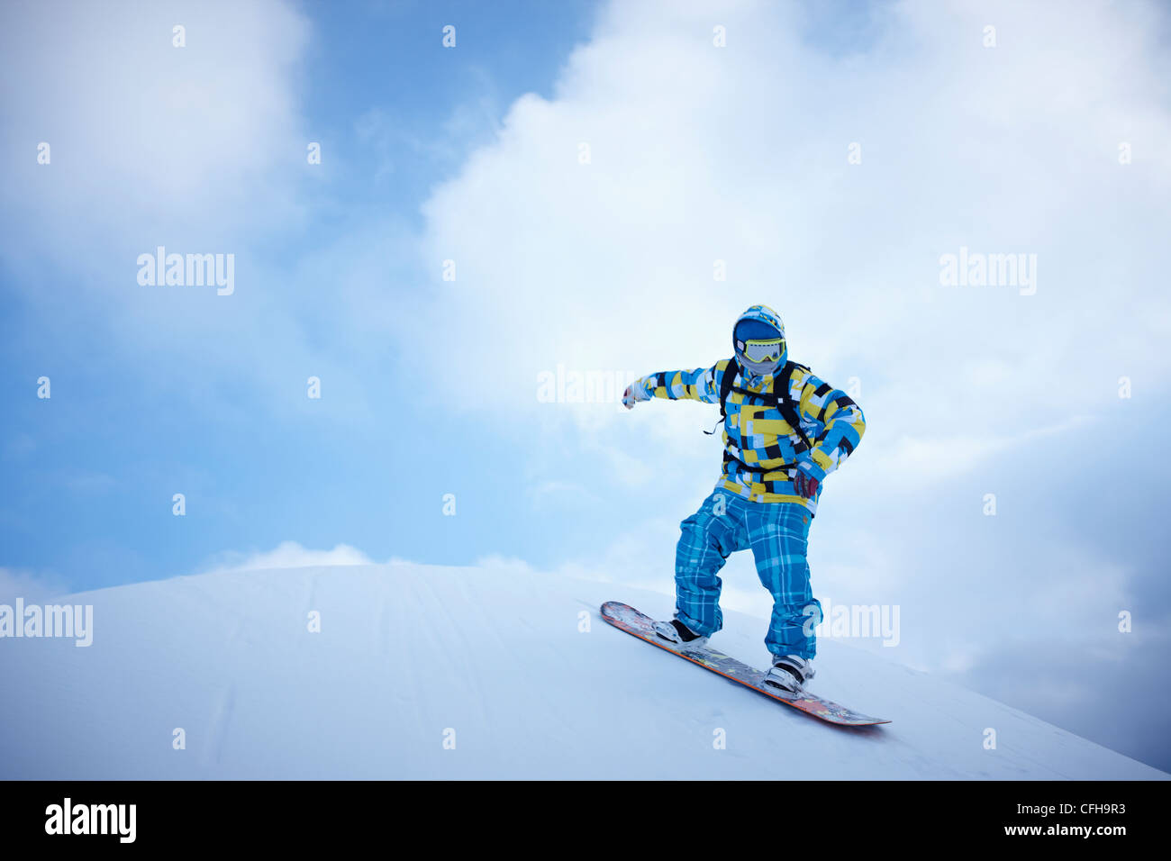 The snowboarding on the slope Stock Photo - Alamy