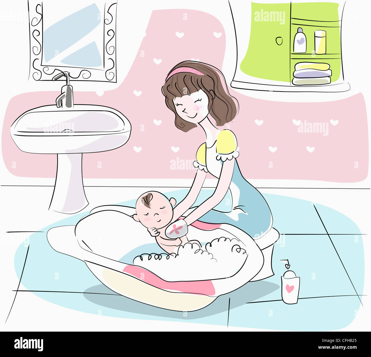 The woman washing the baby Stock Photo - Alamy