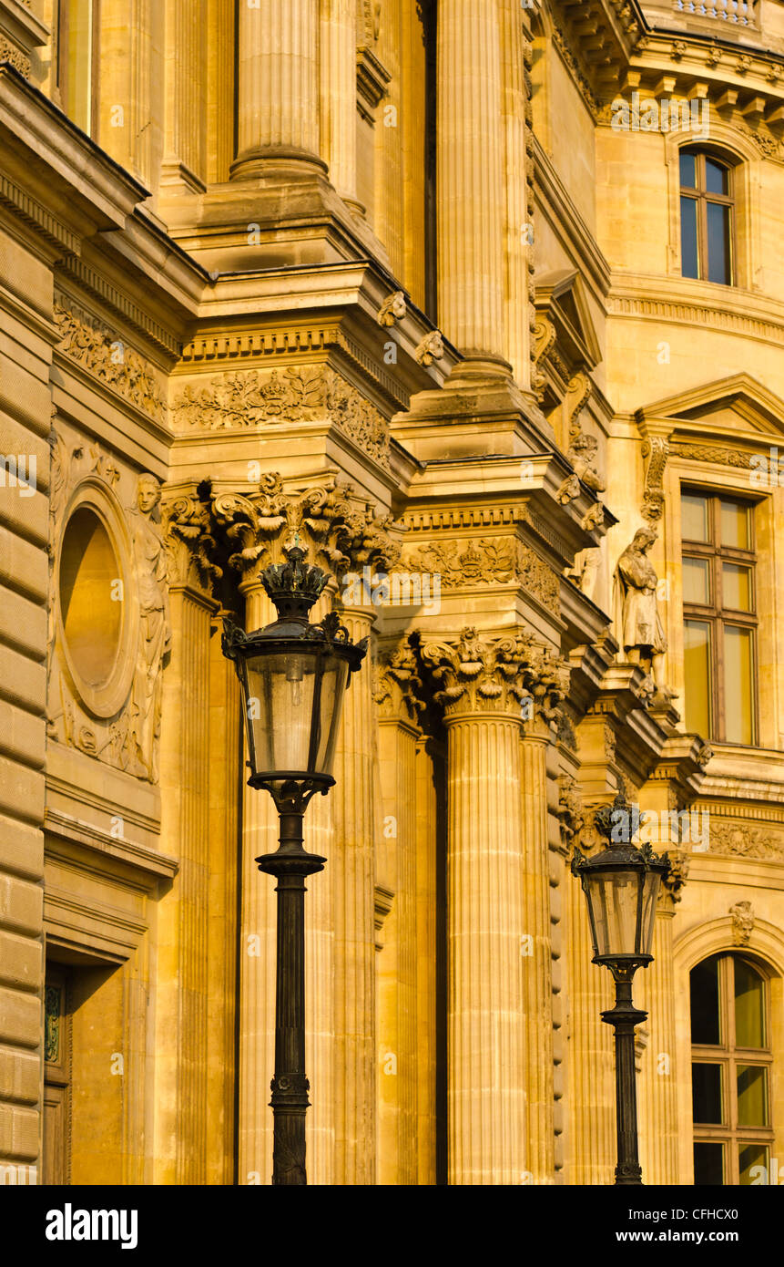 Lamp posts and columns at the Louvre Palace, Louvre Museum, Paris ...