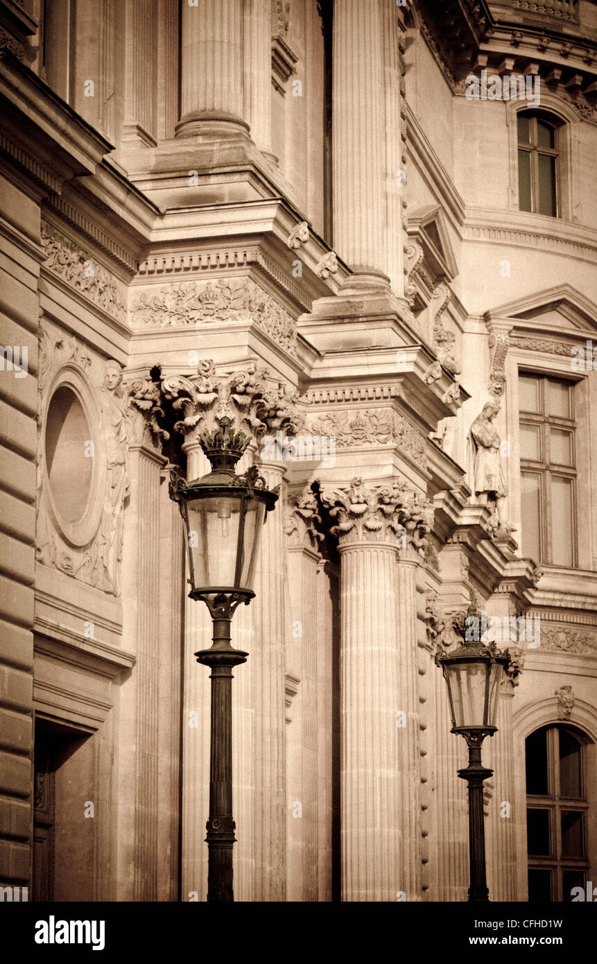 Lamp posts and columns at the Louvre Palace, Louvre Museum, Paris ...