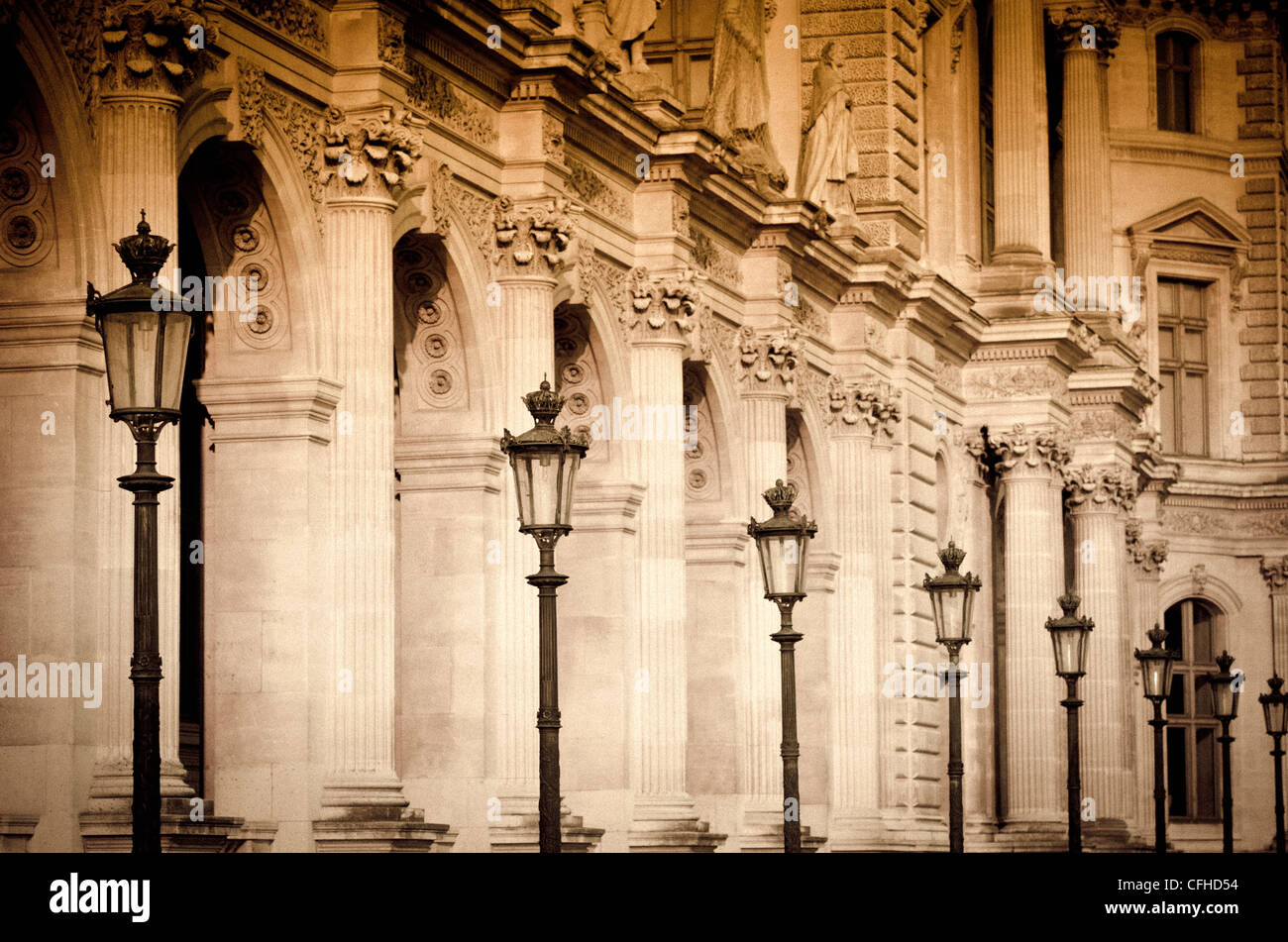 Lamp posts and columns at the Louvre Palace, Louvre Museum, Paris ...