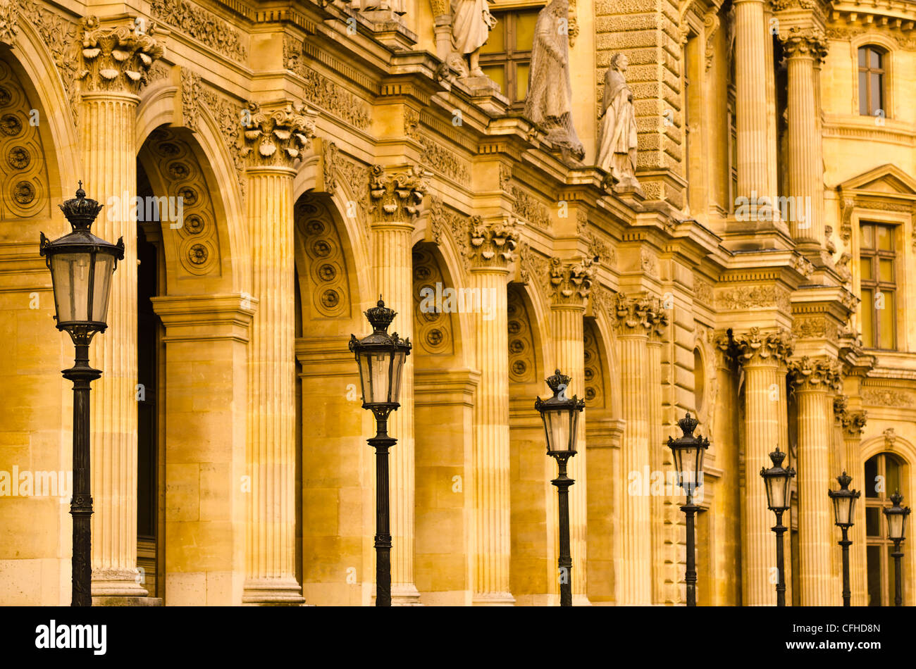 Lamp posts and columns at the Louvre Palace, Louvre Museum, Paris ...