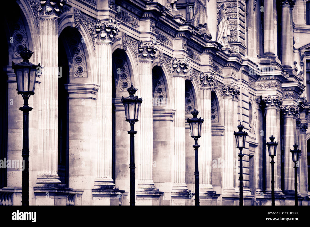 Lamp posts and columns at the Louvre Palace, Louvre Museum, Paris ...