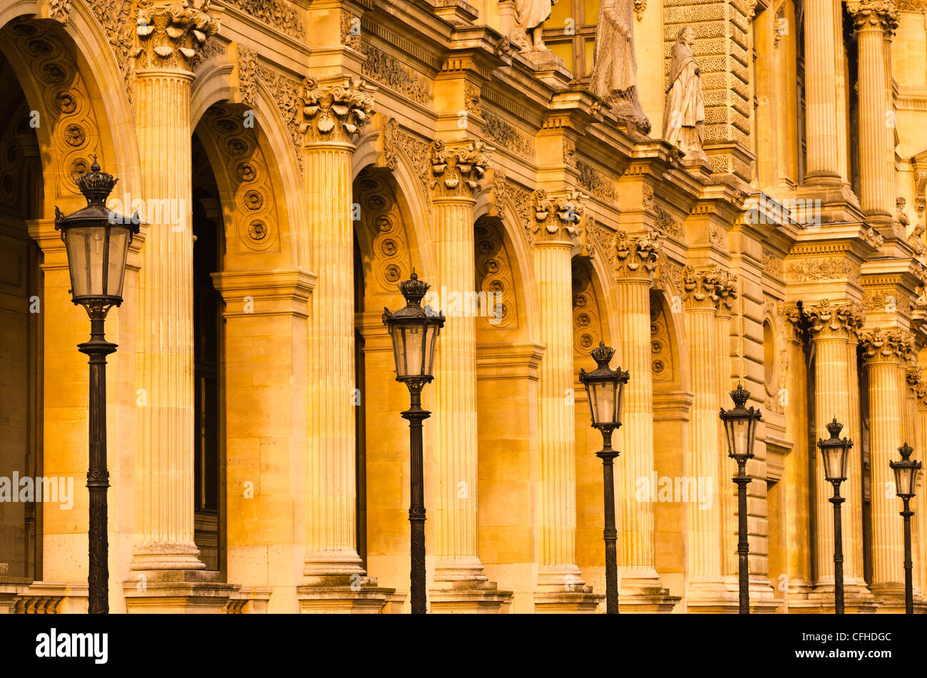 Lamp posts and columns at the Louvre Palace, Louvre Museum, Paris ...