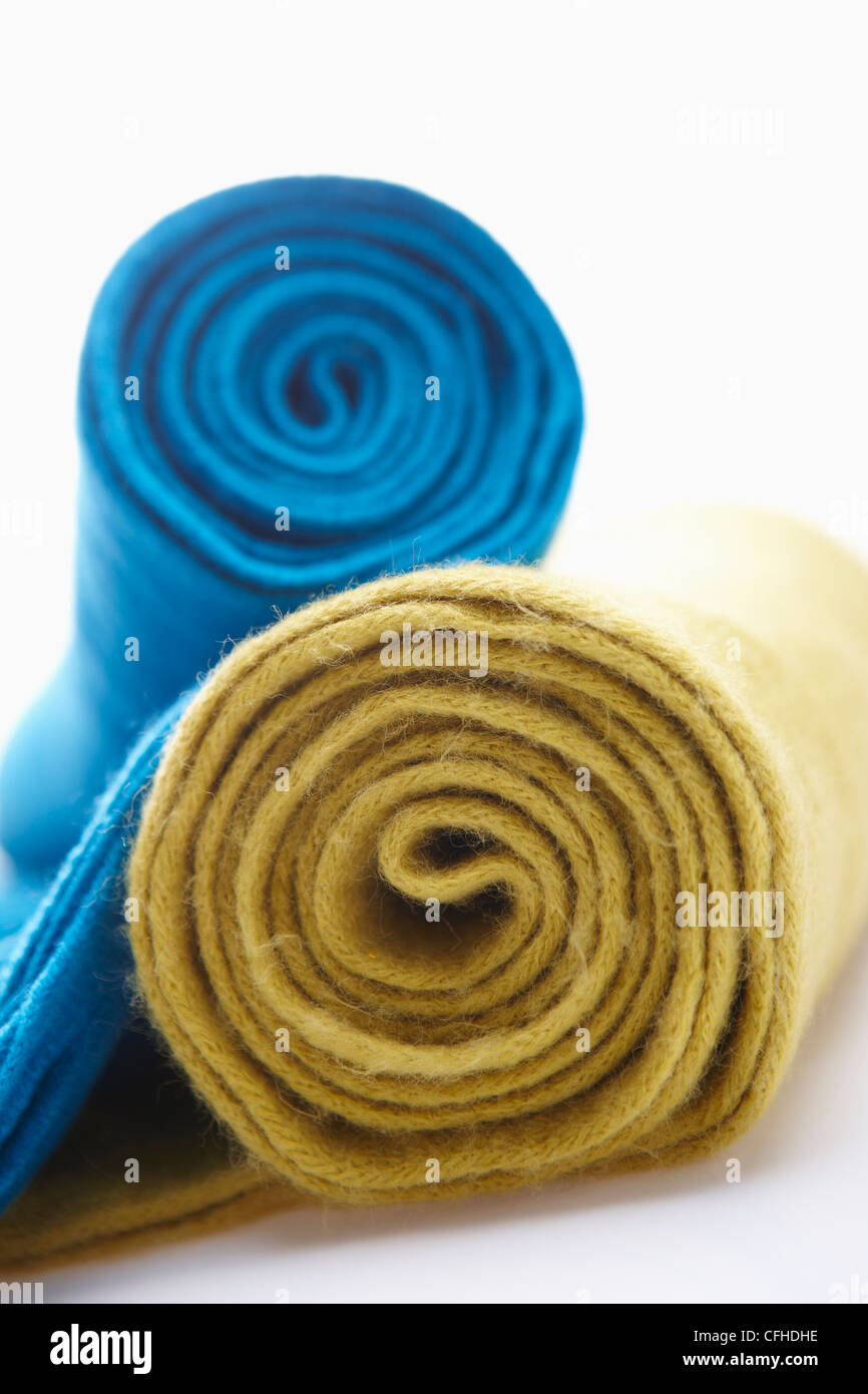 The roll of blue and yellow muffler Stock Photo - Alamy