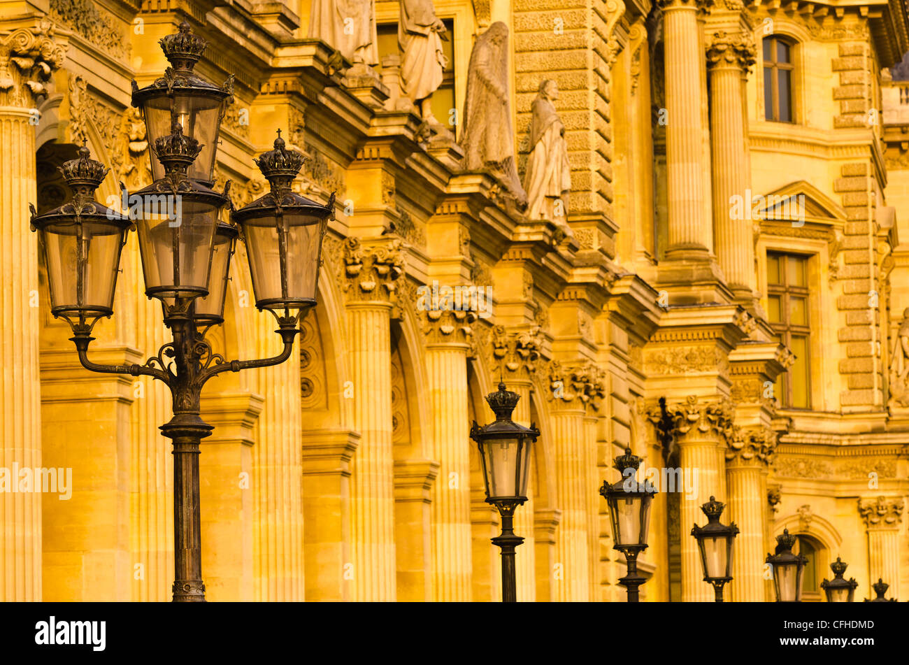 Lamp posts and columns at the Louvre Palace, Louvre Museum, Paris ...