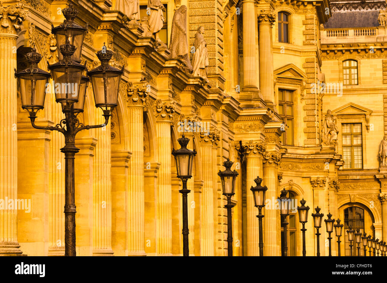 Lamp posts and columns at the Louvre Palace, Louvre Museum, Paris ...