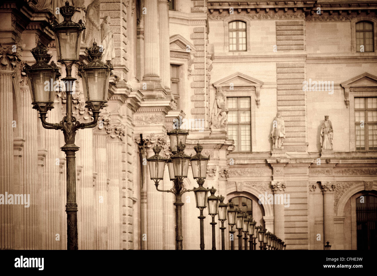 Lamp posts and columns at the Louvre Palace, Louvre Museum, Paris ...