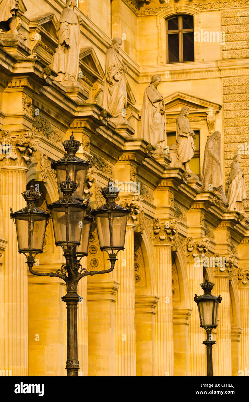 Lamp posts and columns at the Louvre Palace, Louvre Museum, Paris ...