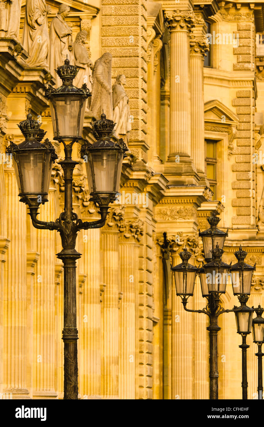 Lamp posts and columns at the Louvre Palace, Louvre Museum, Paris ...
