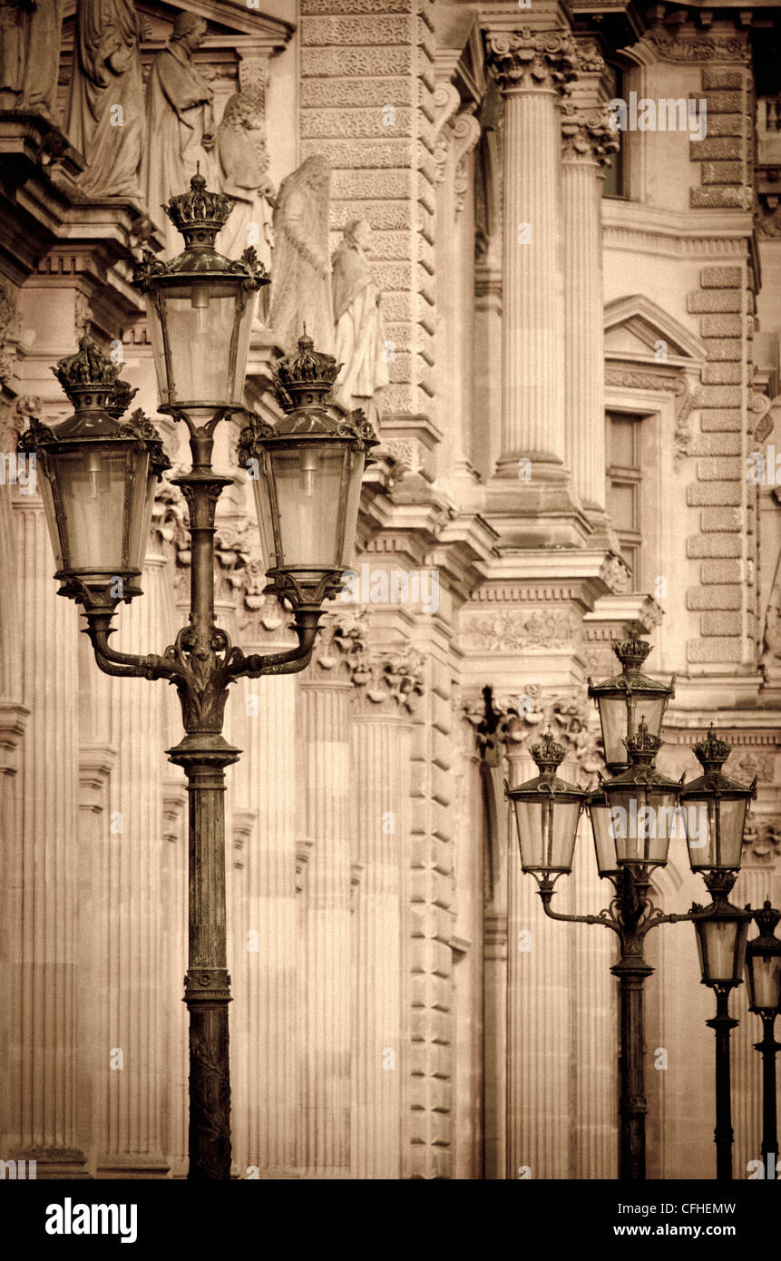 Lamp posts and columns at the Louvre Palace, Louvre Museum, Paris ...