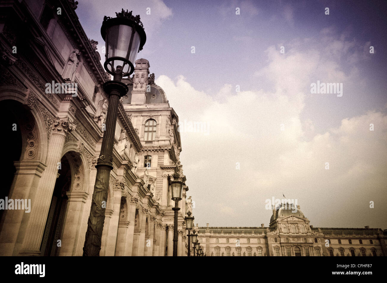 Lamp posts and courtyard at the Louvre Palace, Louvre Museum, Paris ...