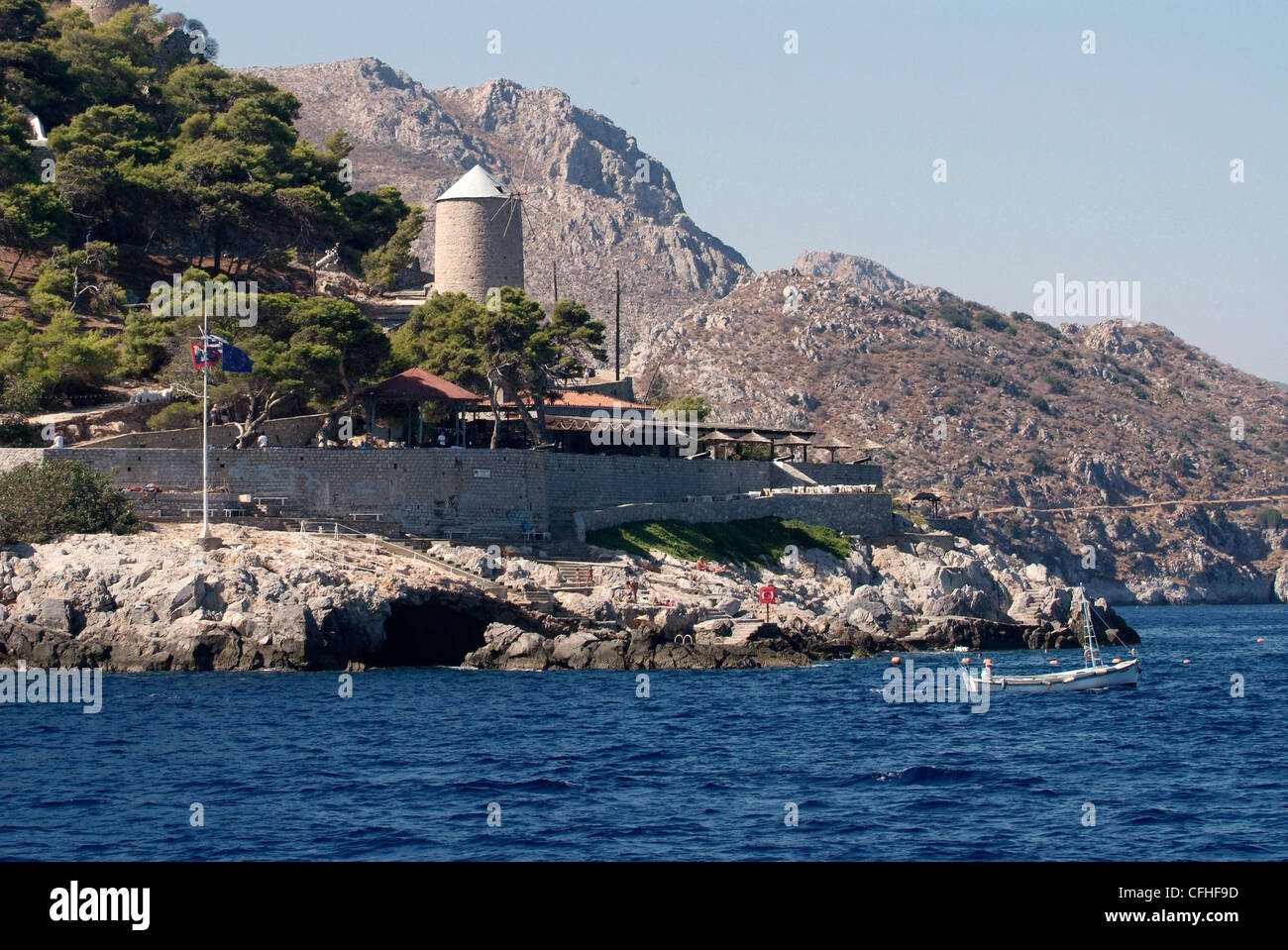 GREECE - Saronic Gulf Hydra . Hydra coast and historic windmill Stock ...