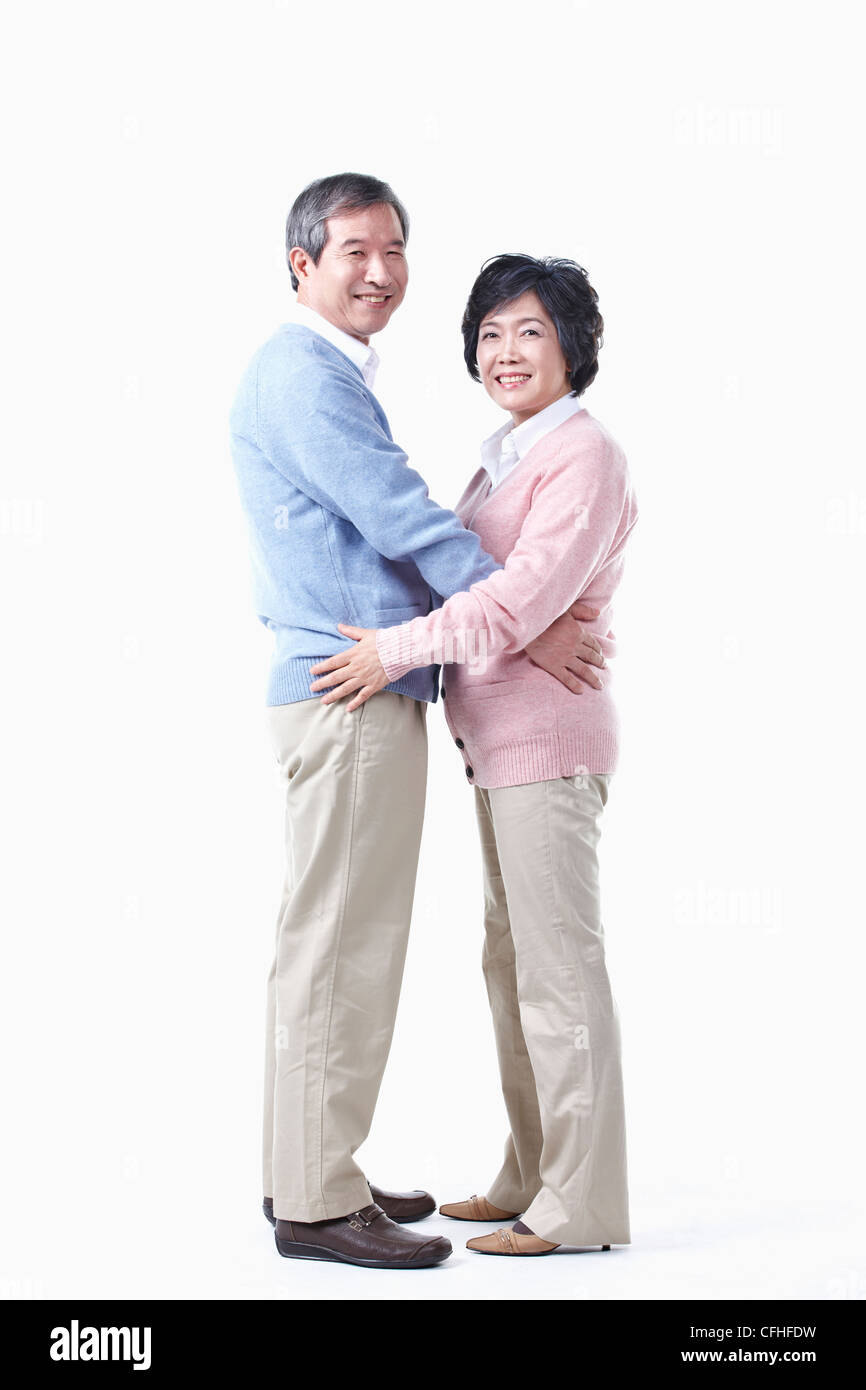 Women with arms around each other Cut Out Stock Images & Pictures - Alamy