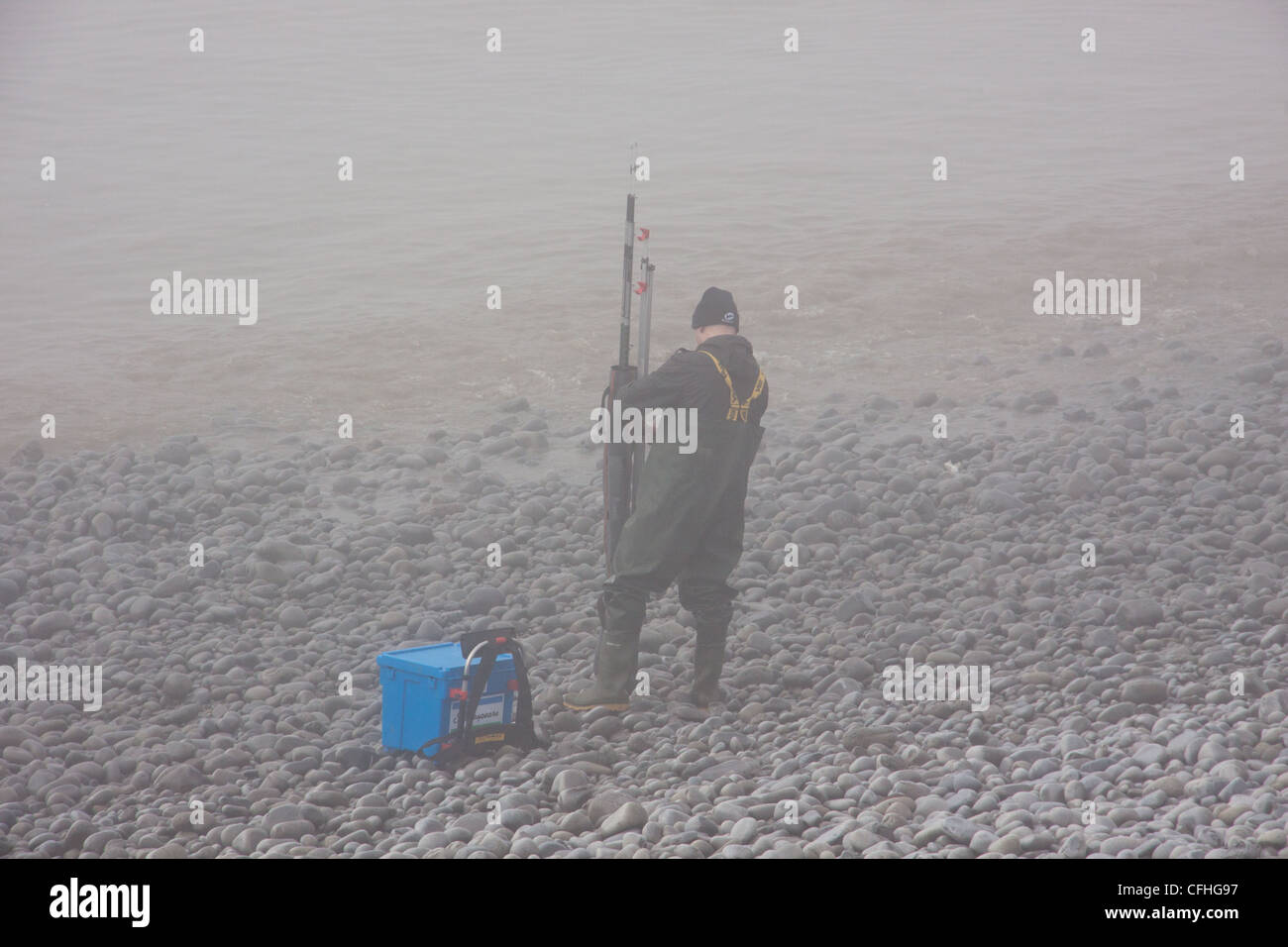 fisherman in the fog,fishing in sea fog,sea mist Stock Photo - Alamy