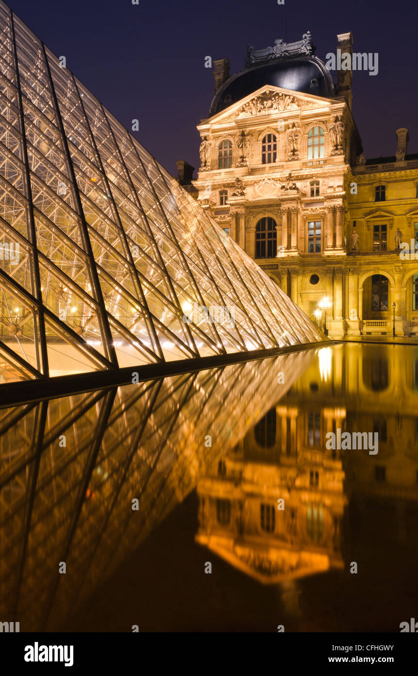 Louvre Palace and Pyramid at night, Louvre Museum, Paris, France Stock ...