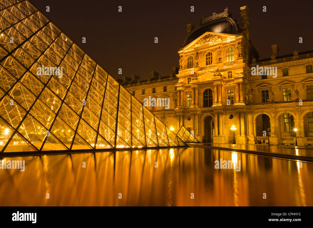 Louvre Palace and Pyramid at night, Louvre Museum, Paris, France Stock ...