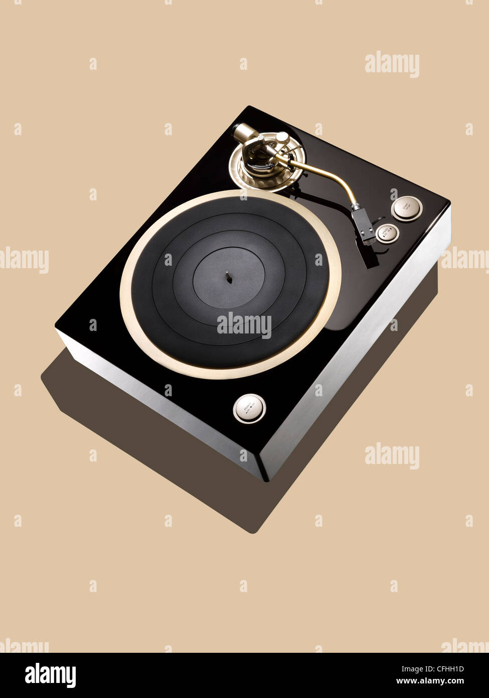 A black record deck on a beige background Stock Photo - Alamy