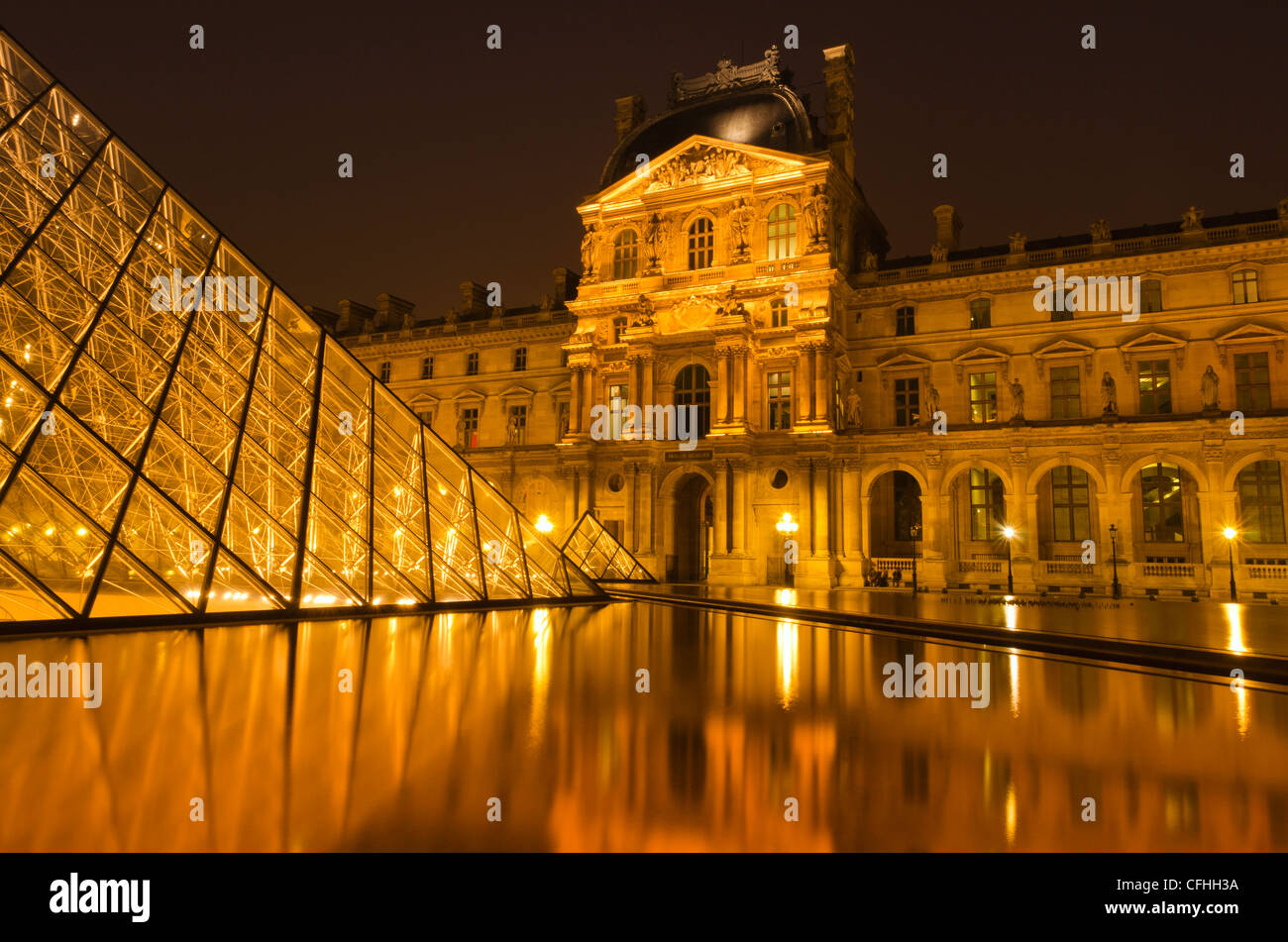 Louvre Palace and Pyramid at night, Louvre Museum, Paris, France Stock ...