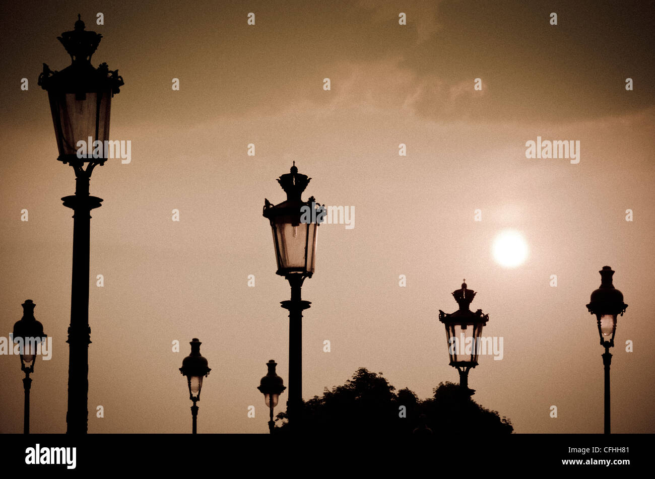 Lamp posts at sunset, Louvre Museum, Paris, France Stock Photo - Alamy