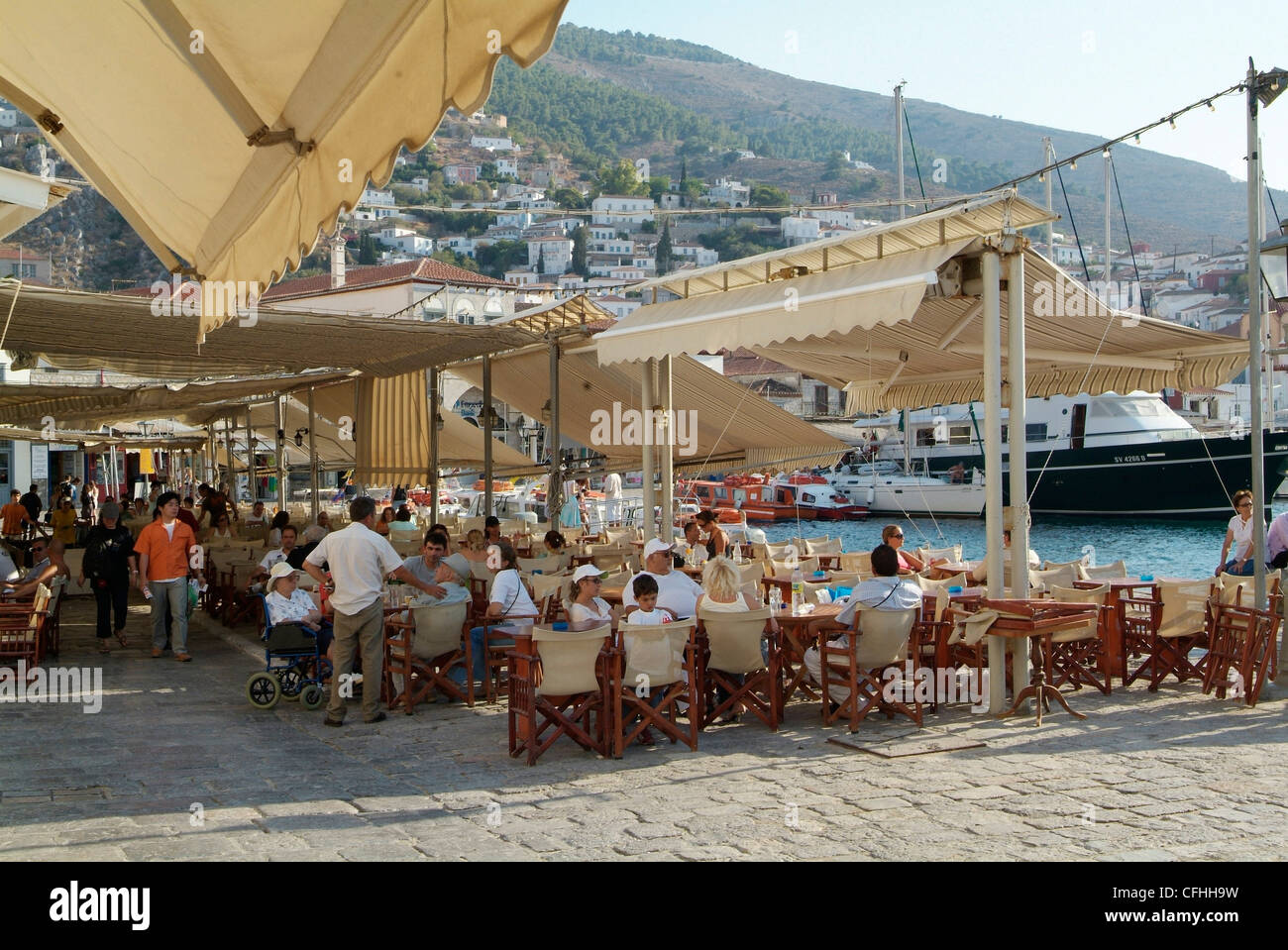 Greece The Saronic Gulf Island of Hydra waterfront restaurants Stock ...