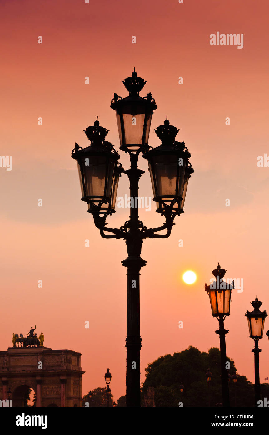 Lamp posts at sunset, Louvre Museum, Paris, France Stock Photo - Alamy