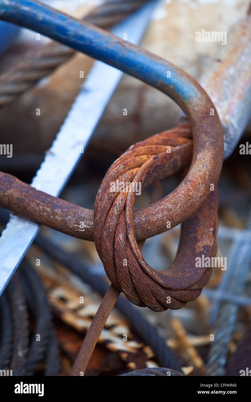 Close up of a corroded or broken wire rope left in waste skips Montrose ...