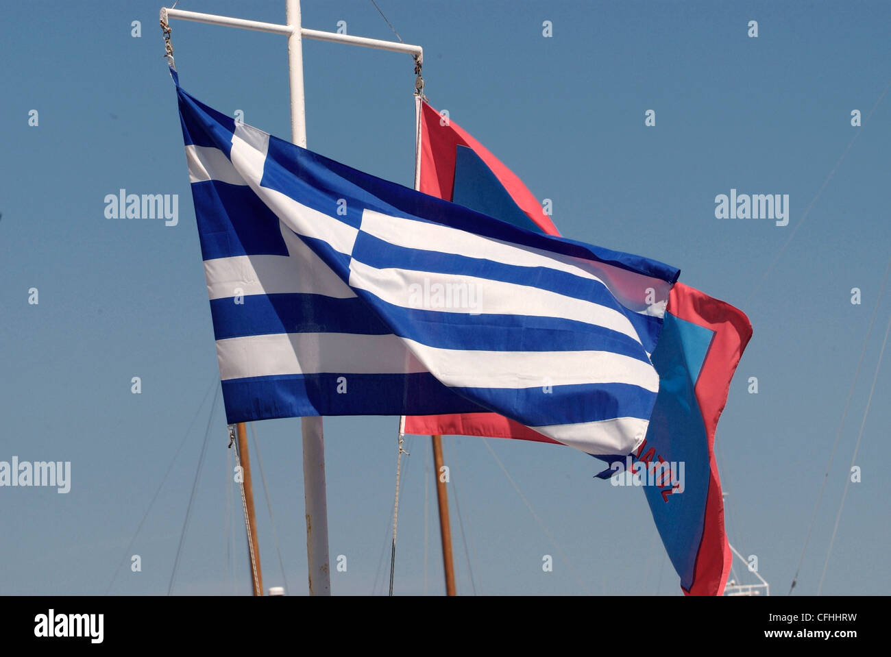 GREECE Saronic Gulf Island of Spetses old town. Greek flag Stock Photo ...