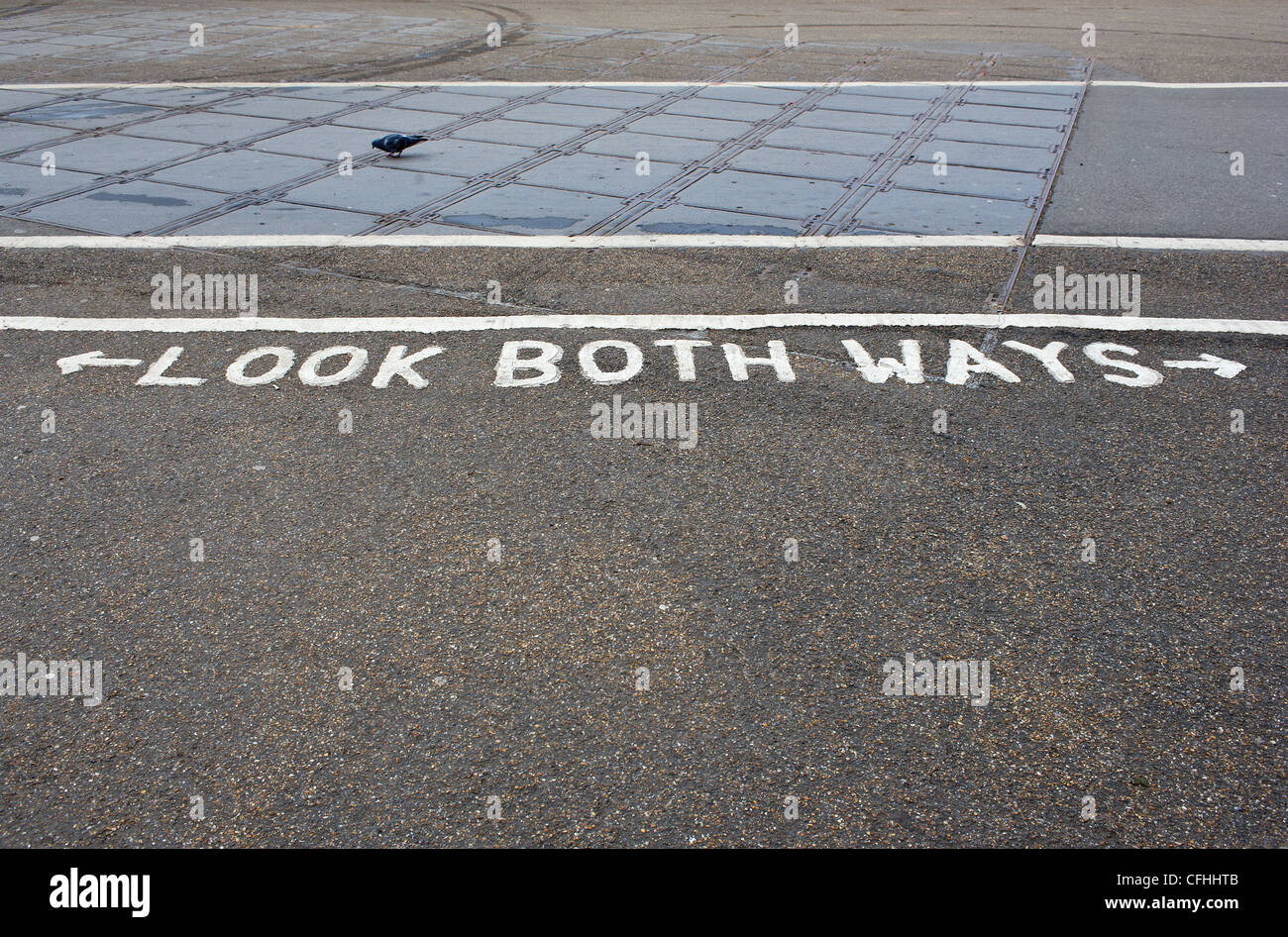 A sign painted on the ground Stock Photo - Alamy