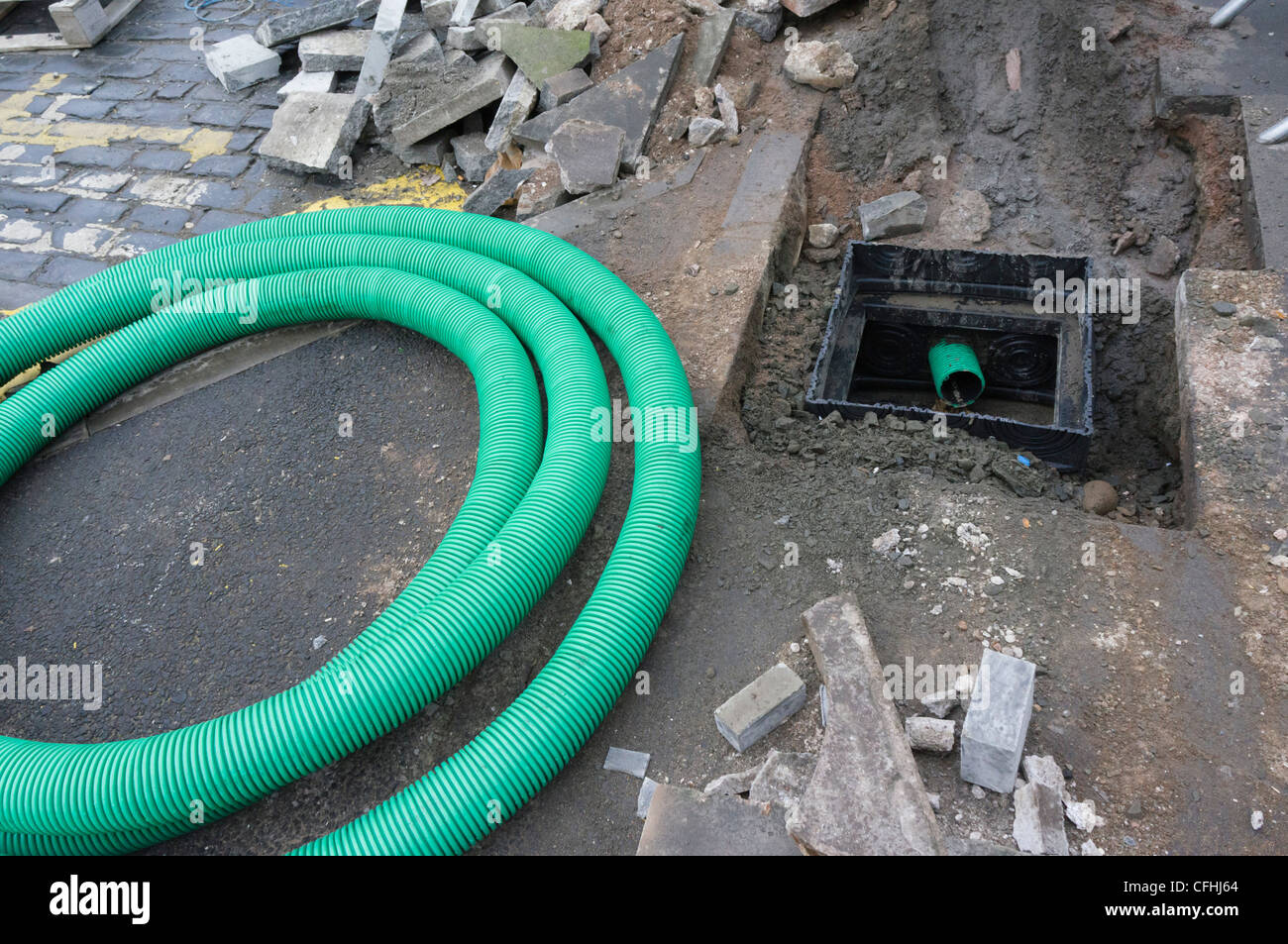 Water services excavation to install new flexible sewerage pipes in a ...