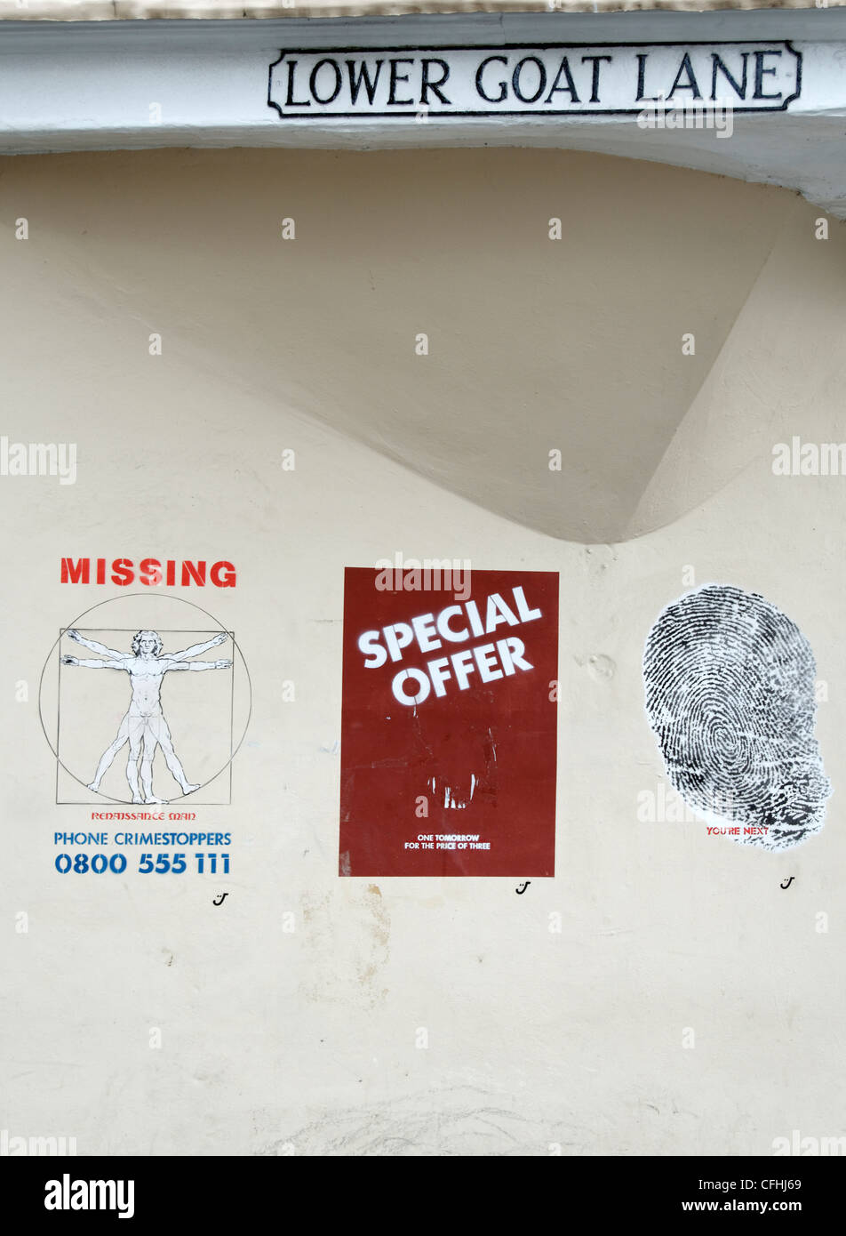 Bill posting in the centre of Norwich Stock Photo - Alamy