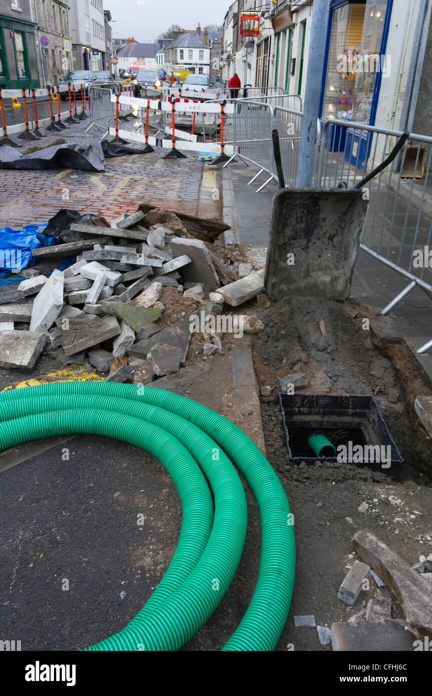 Water services excavation to install new flexible sewerage pipes in a ...